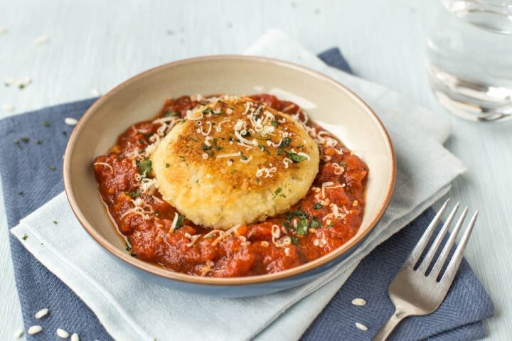 Cheesy Risotto Cakes in Tomato Sauce - Easy Cheesy Vegetarian